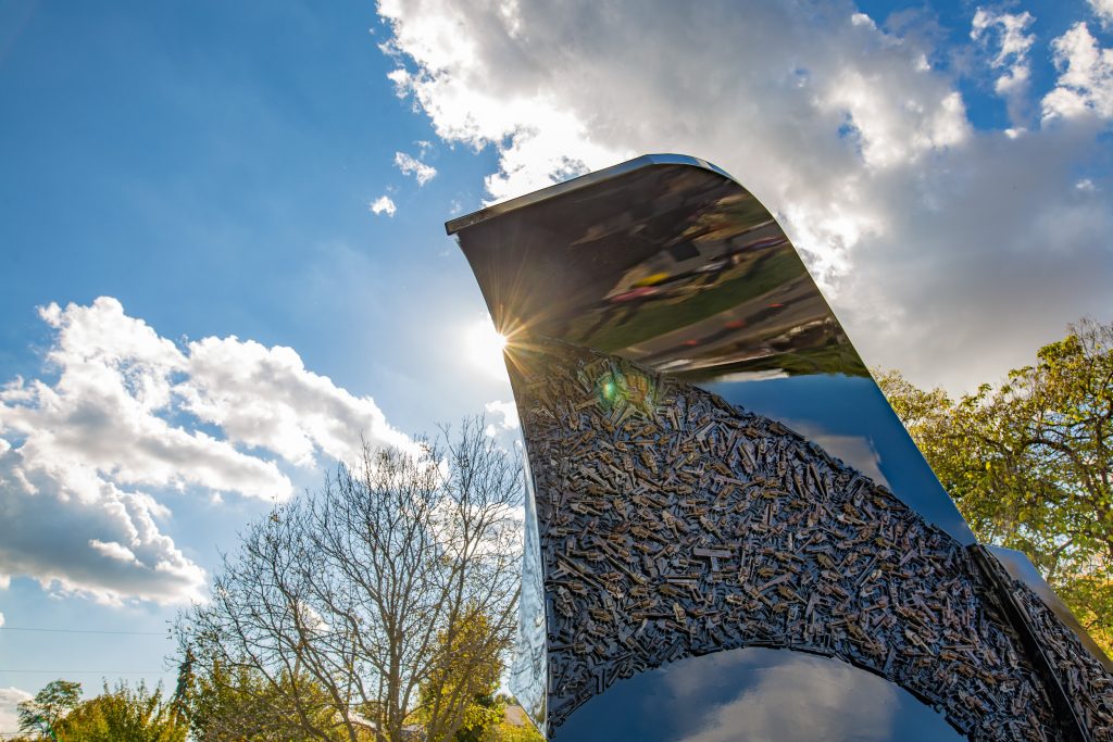 'Guns Into Plowshares' sculpture is the site of a vigil for Florida ...