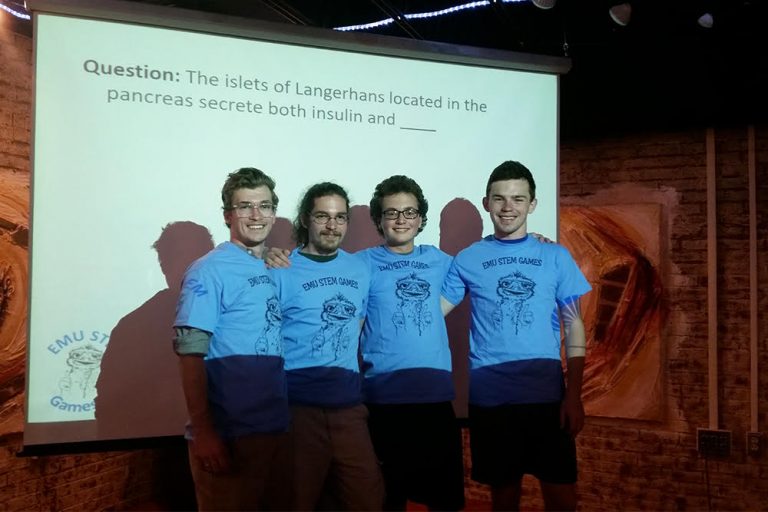 Salticids hoist the 2019 Quiz Bowl trophy (um, ok, they got t-shirts ...